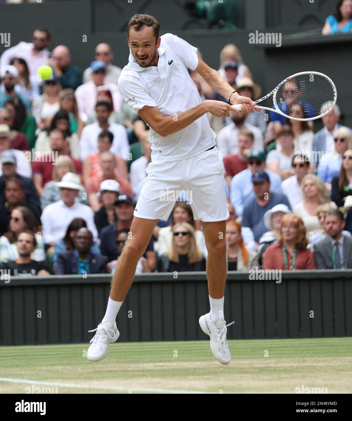 London, UK. 12th July, 2024. Daniil Medvedev plays a backhand in his ...
