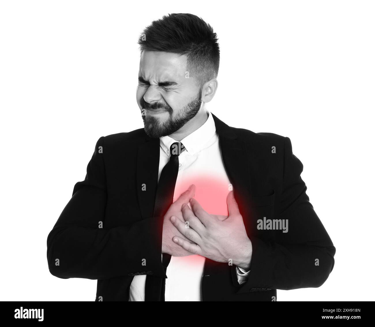 Heart attack. Businessman writhing in pain and pressing hands to chest ...