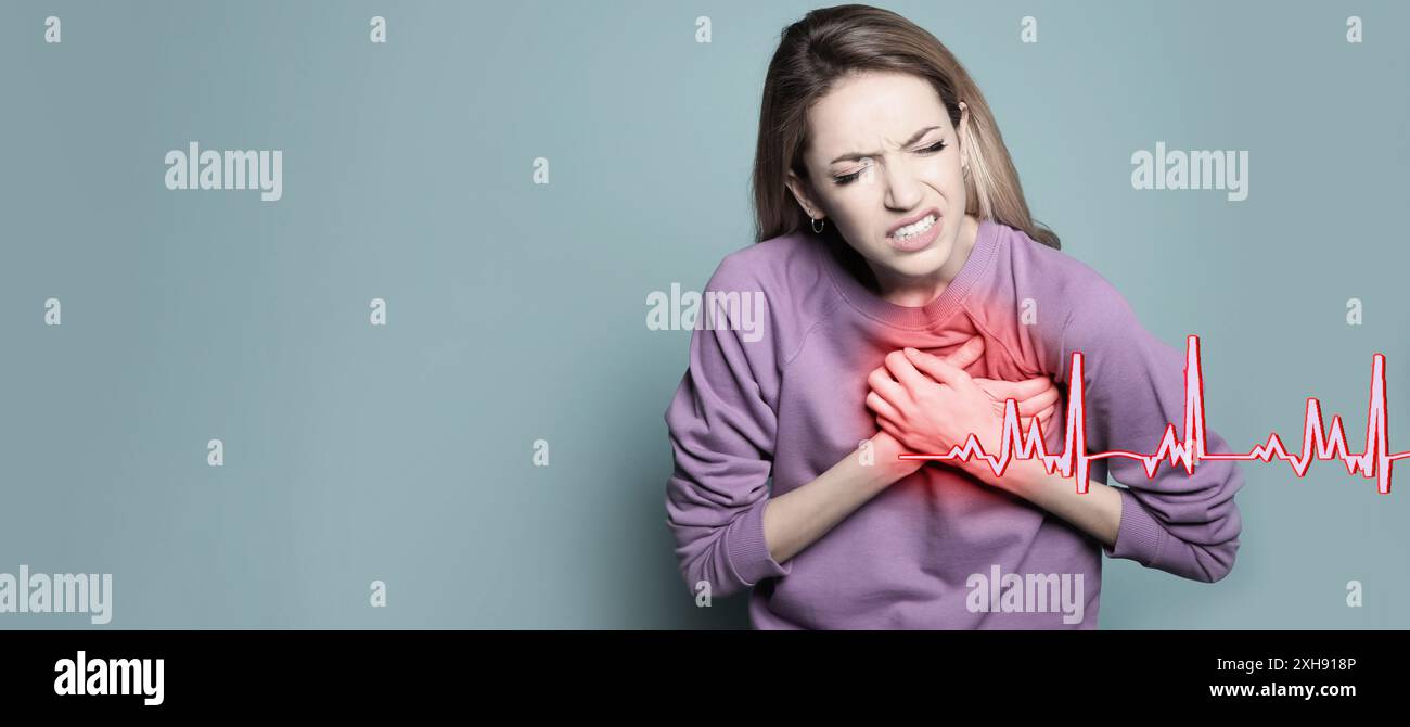 Heart attack. Woman writhing in pain and pressing hands to chest on ...