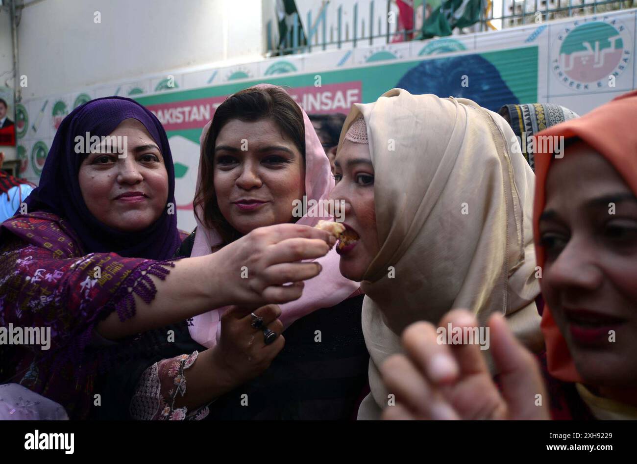 KARACHI, PAKISTAN, JUL 12: Activists of Tehreek-e-Insaf (PTI) are holding celebration ...