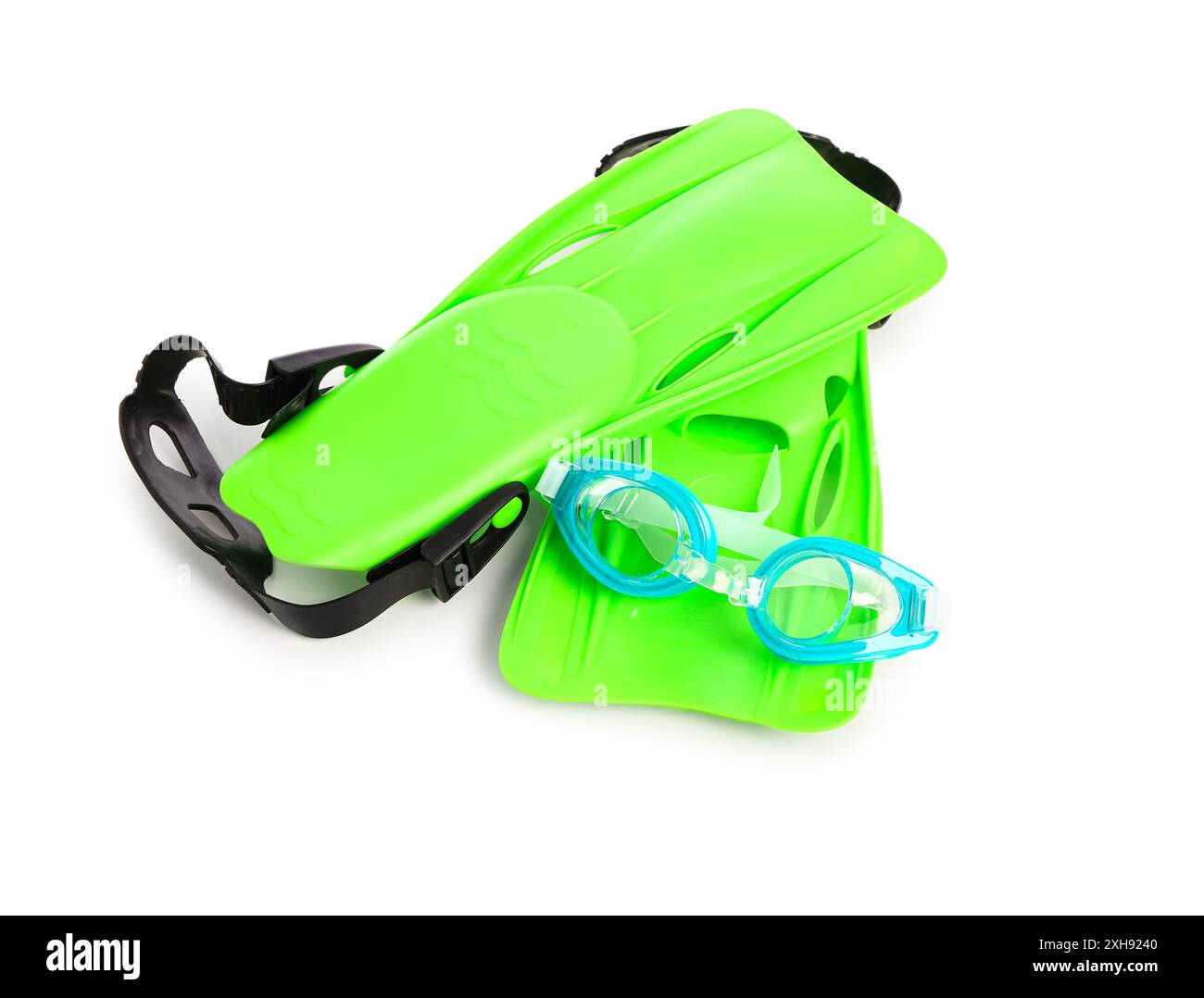 New swimming goggles and flippers on white background Stock Photo - Alamy