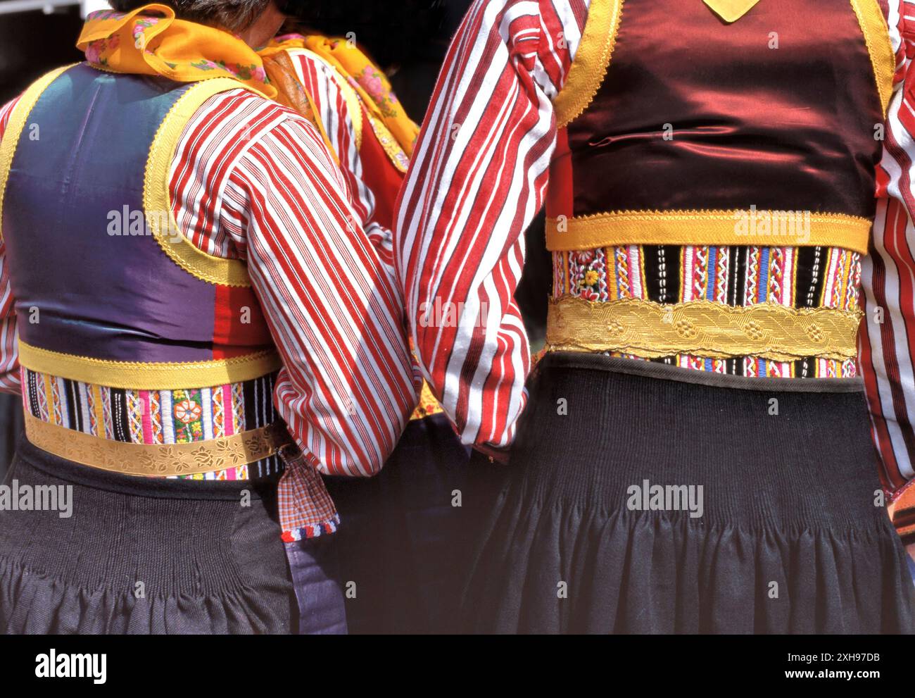 Two women in traditional costume at Marken, Holland. At Kingsday people ...