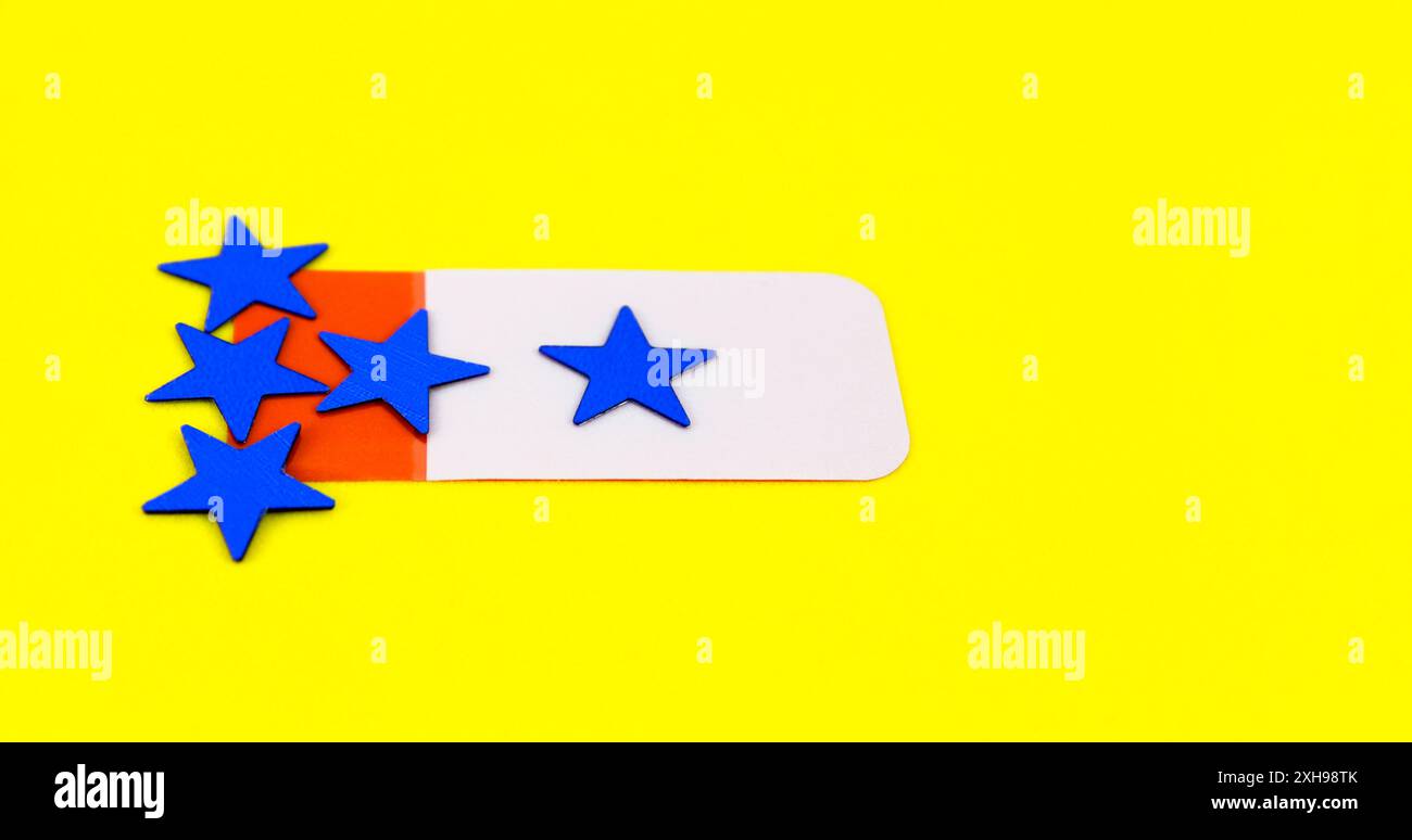 Five blue stars on adhesive note Stock Photo - Alamy