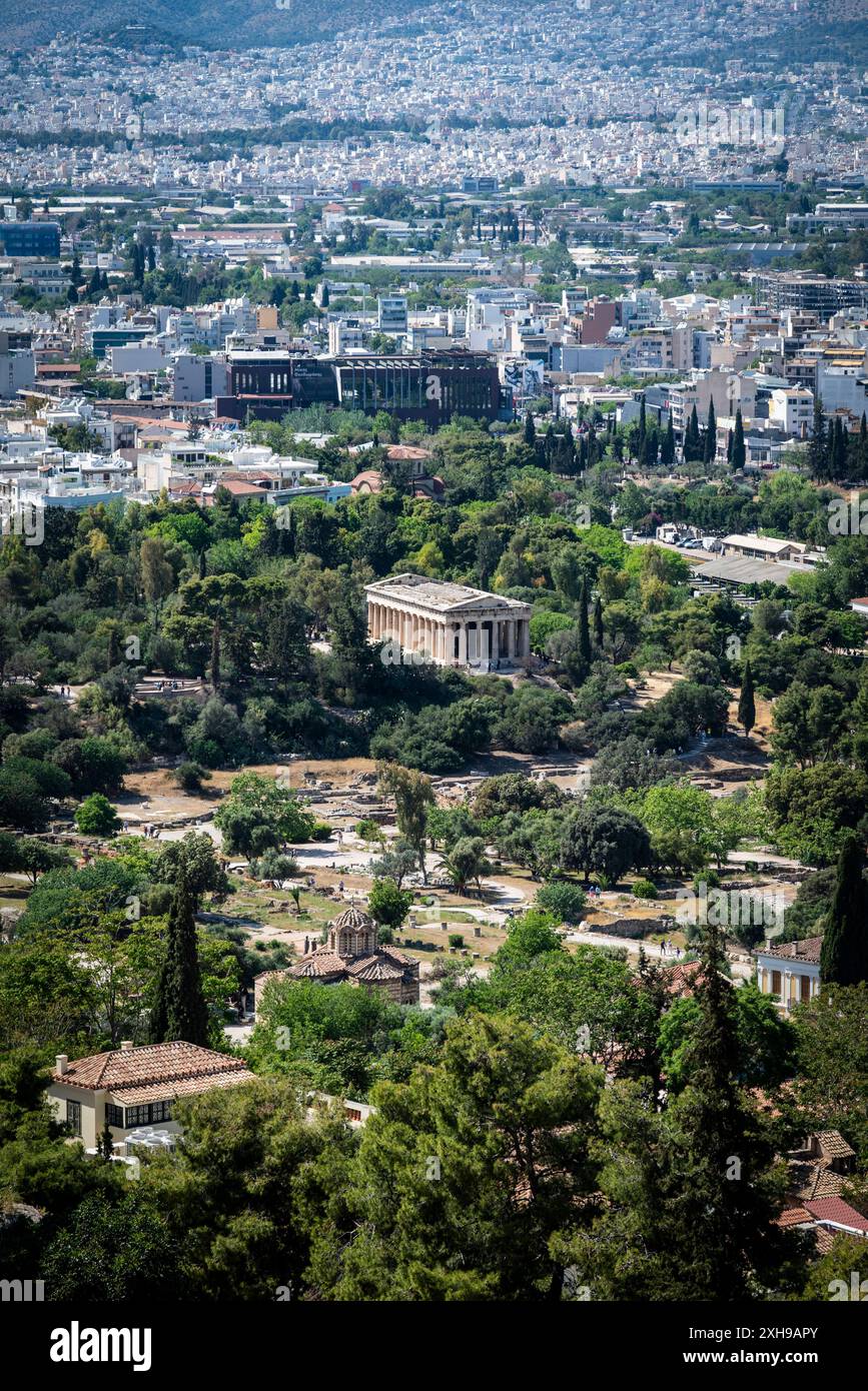 View of the ancient Agora with Temple of Hephaestus and modern city ...
