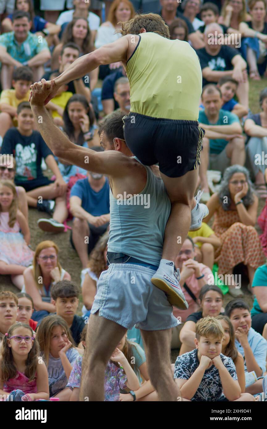 Viladecasn, SPAIN - JULY 11, 2024: Two athletes celebrate together at a ...