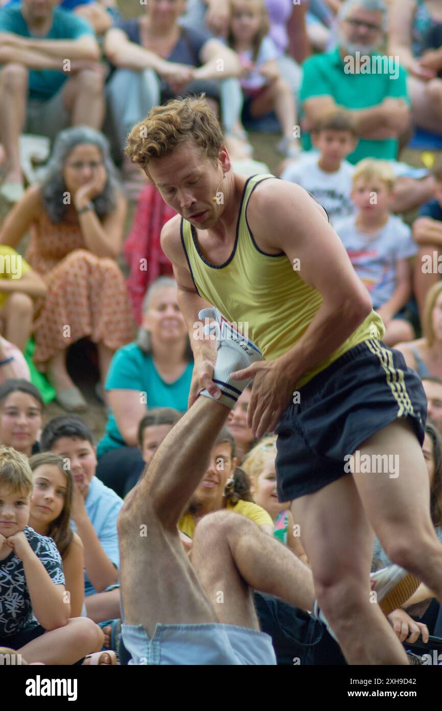 Viladecasn, SPAIN - JULY 11, 2024: Two athletes celebrate their victory ...