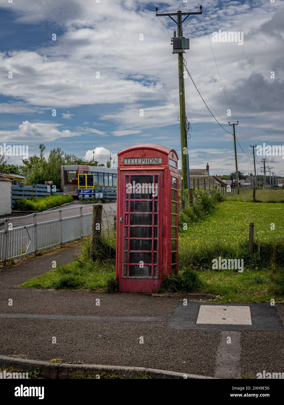 An old-fashioned still working public red telephone box in Scotland on ...