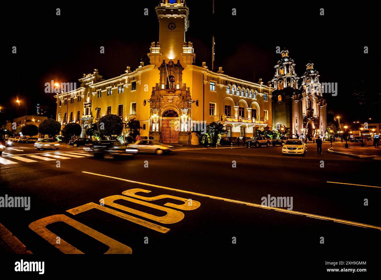 Lima, Peru - City hall building of Miraflores illuminated at night ...