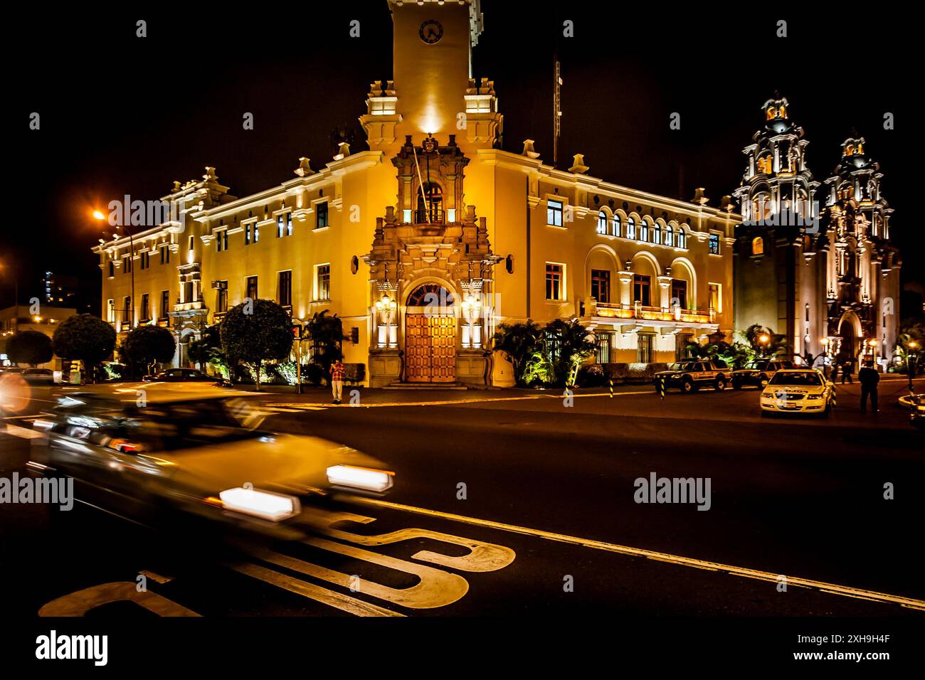 Lima, Peru - City hall building of Miraflores illuminated at night ...