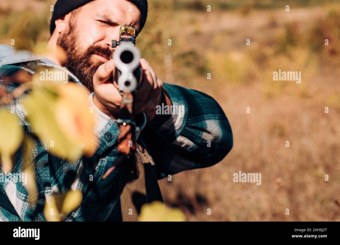 Calibers of hunting rifles. Hunter with shotgun gun on hunt. Hunting is ...