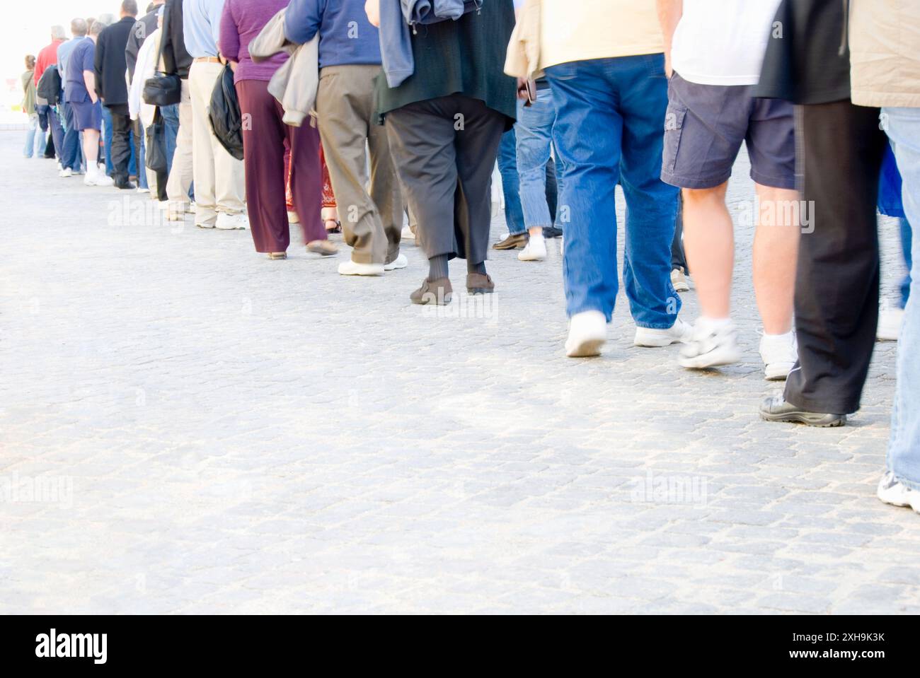 People waiting in line on cobblestone walkways - Oporto (also Porto ...