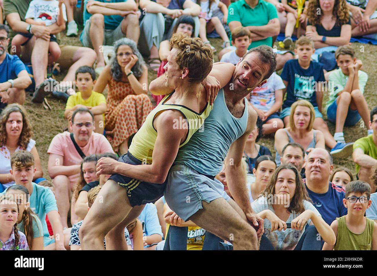 Viladecasn, SPAIN - JULY 11, 2024: Two athletes engage in close-contact ...