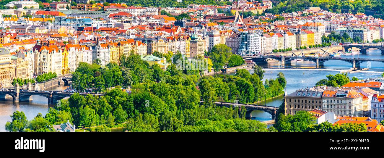 A scenic aerial view of the Vltava River winding through the heart of ...