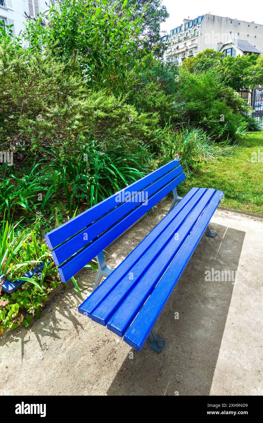 Park bench painted in "International Klein Blue" in the Square Yves ...