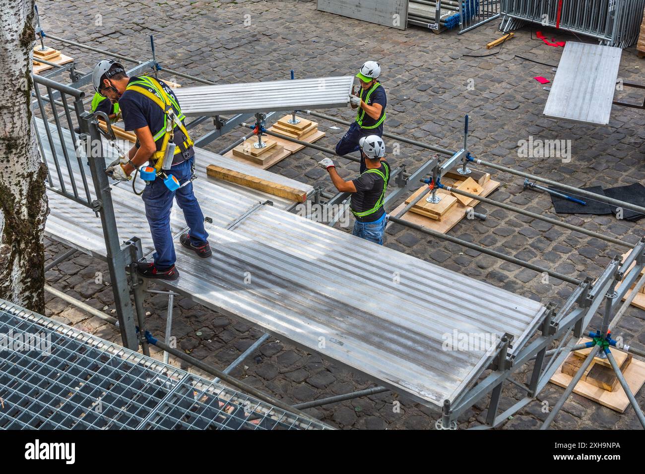 Workers assembling seating in advance of the Olympic Games opening ...