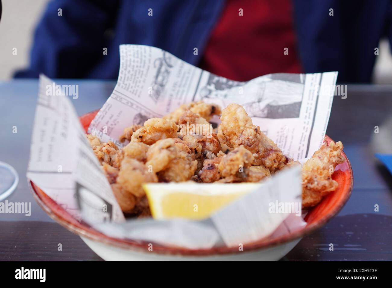 Chipirones fritos (Fried baby squid), one of the most typical tapas ...