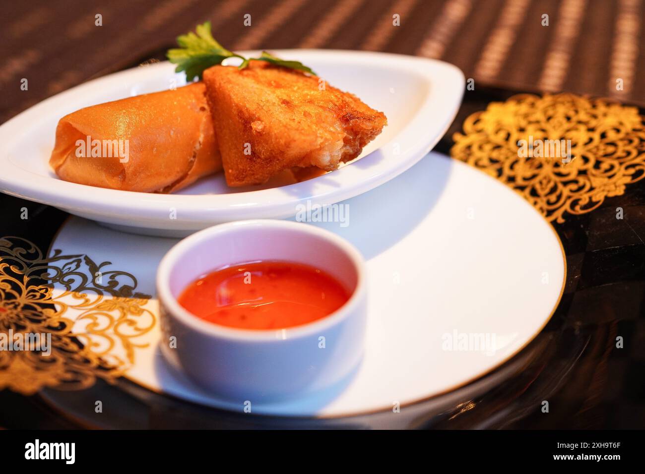 Chinese spring rolls and deep-fried bread with shrimp paste made by a ...