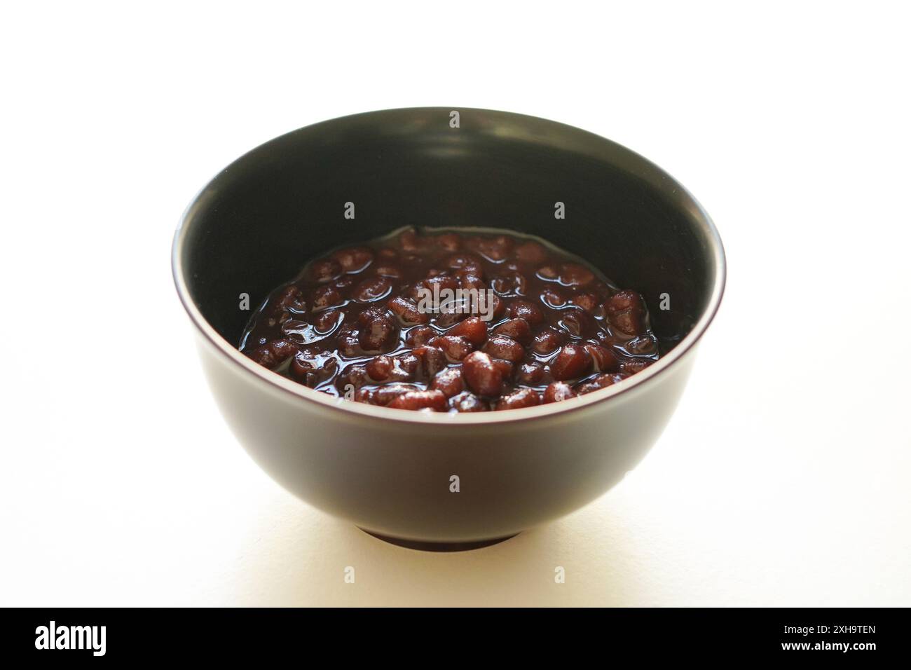 Zenzai on white background, Japanese food made by boiling azuki beans ...