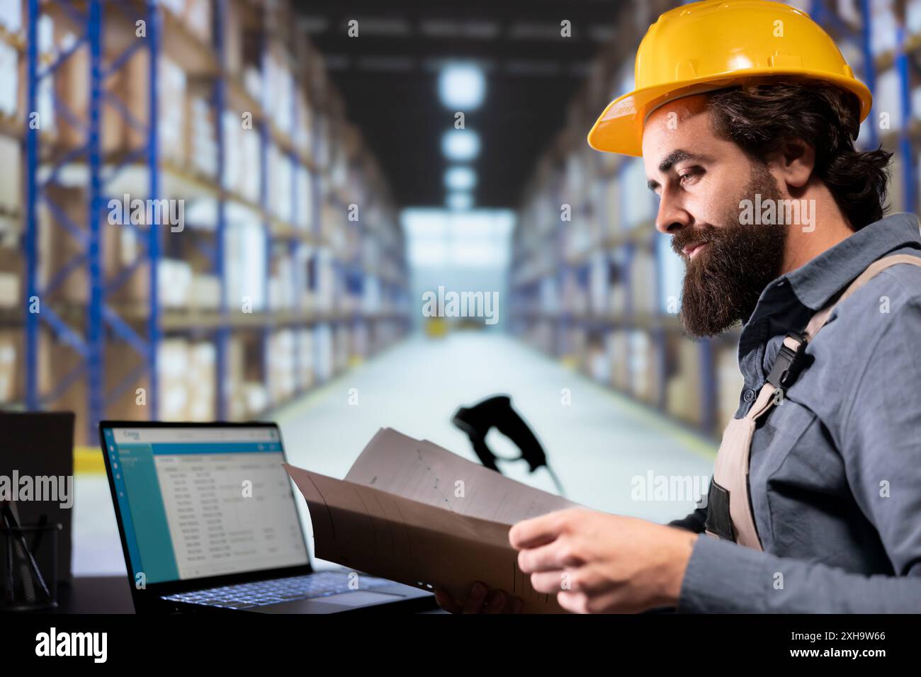 Production supervisor reading order receipts from archived folders ...