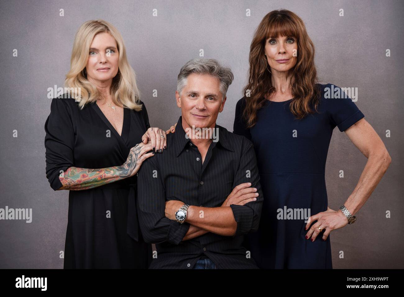 Erika Eleniak, from left, Billy Warlock and Alexandra Paul pose for a portrait to promote the ...