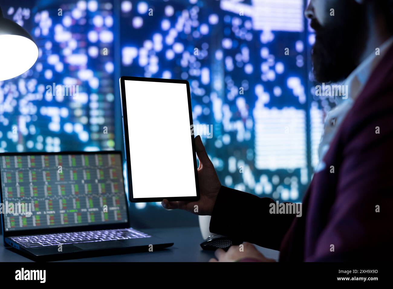 Private equity consultant uses white display on modern tablet, sitting ...