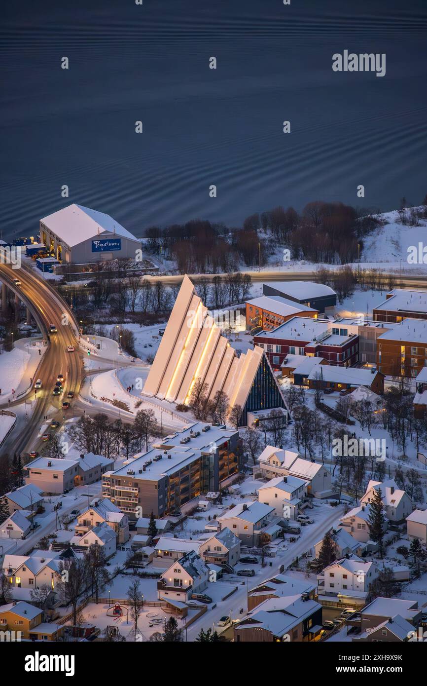 An aerial view of the Arctic Cathedral in Tromso, Norway surrounded by ...