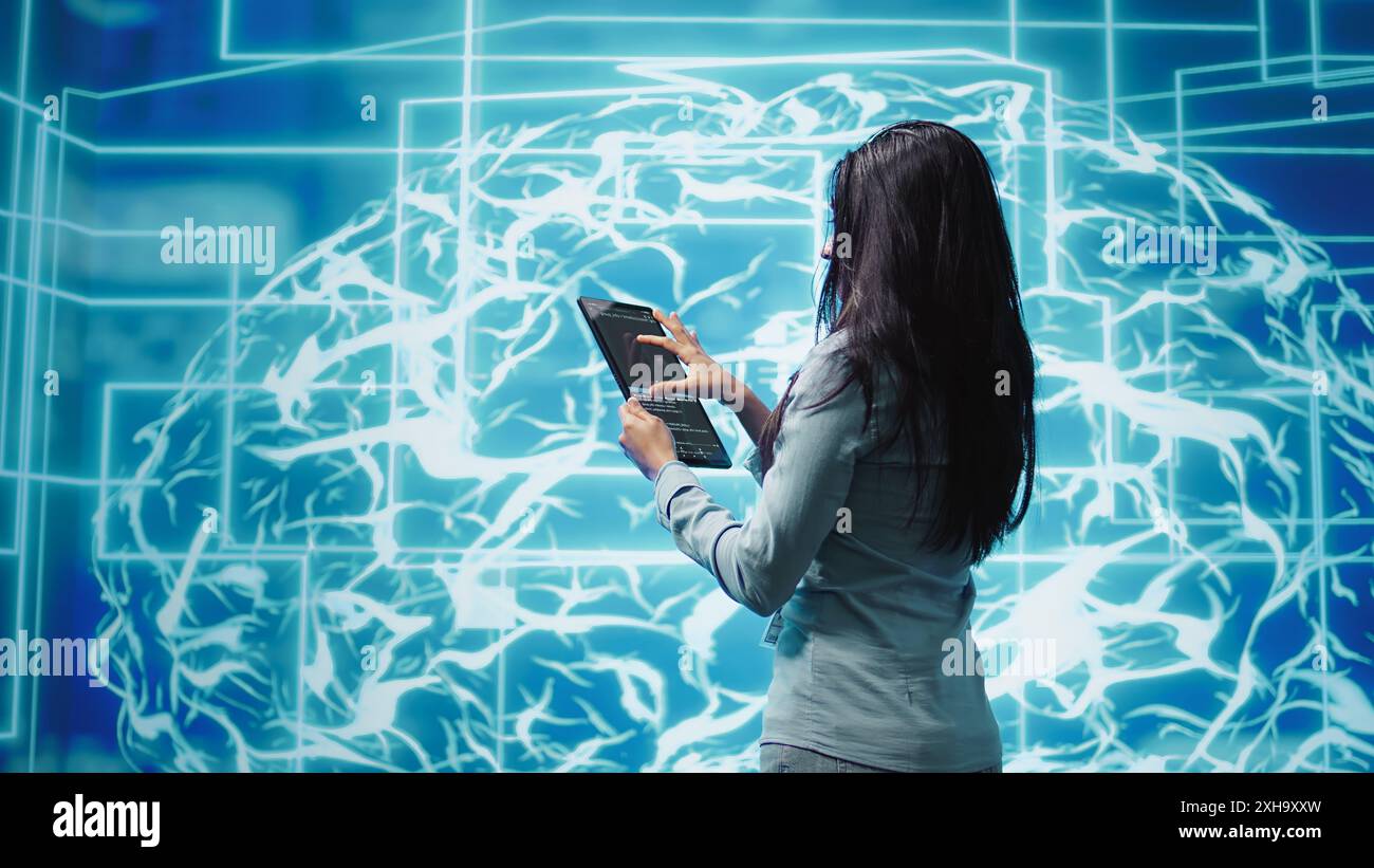 Computer scientist using artificial intelligence computing simulating human brain thought ...