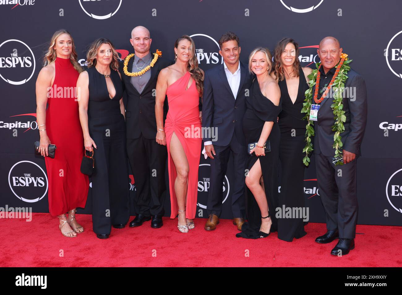 Paige Alms, guests, Andrea Moller, Kai Lenny, Molly Lenny, guest, and ...