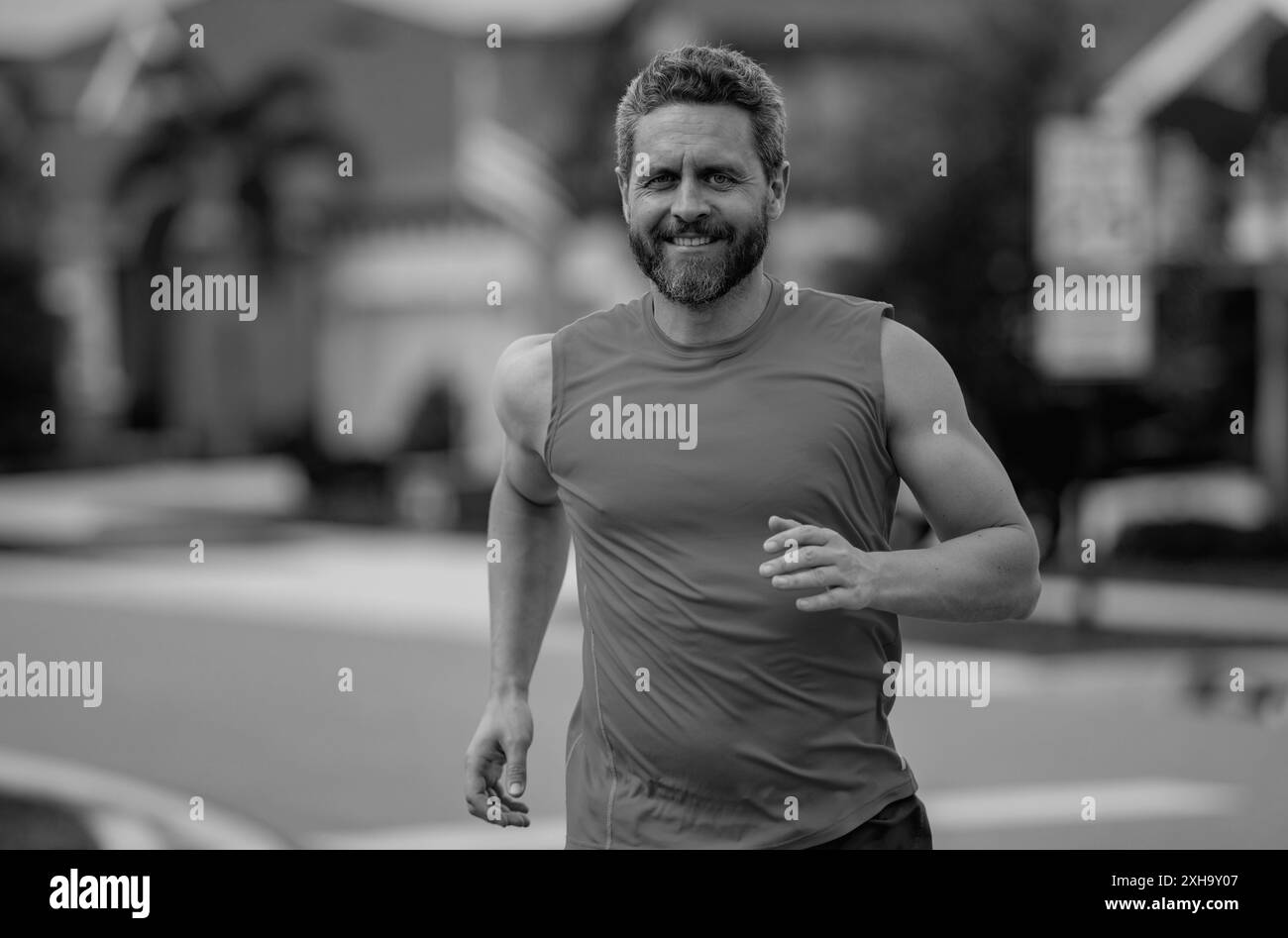 Running man sprinting workout outdoor. Fit athlete man running on ...