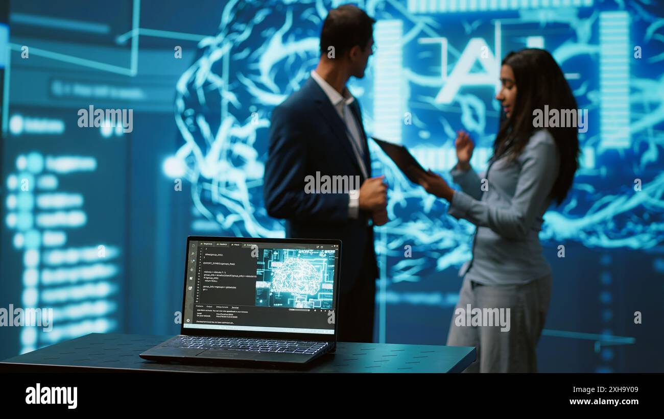 Focus on laptop in workspace used by AI researchers working with ...