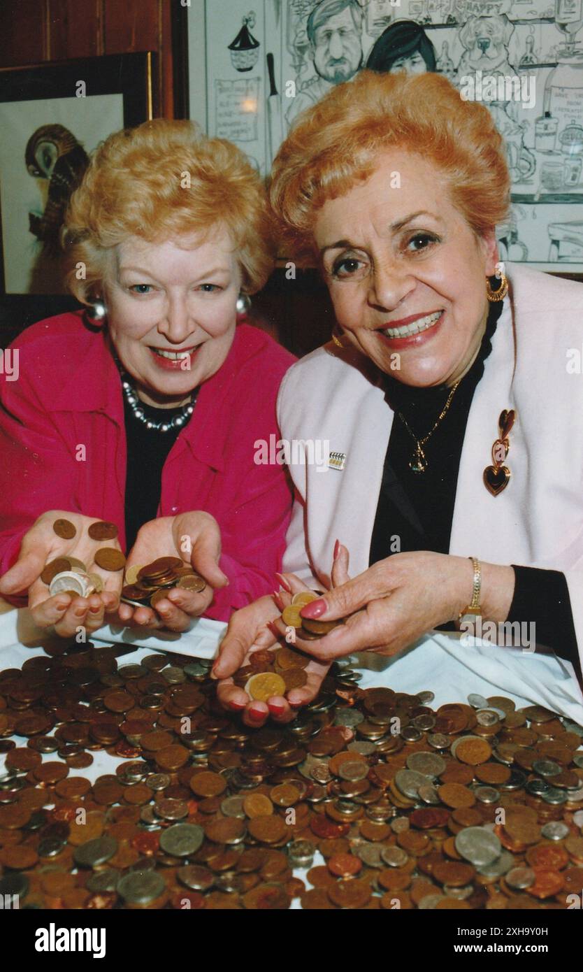 JUNE WHITFIELD AND CARMEN SILVERA COUNT THE CHARITY BOTTLE PENNIES AT ...