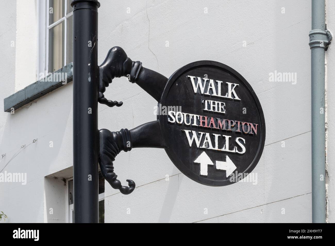 Quirky sign shaped like feet hi-res stock photography and images - Alamy