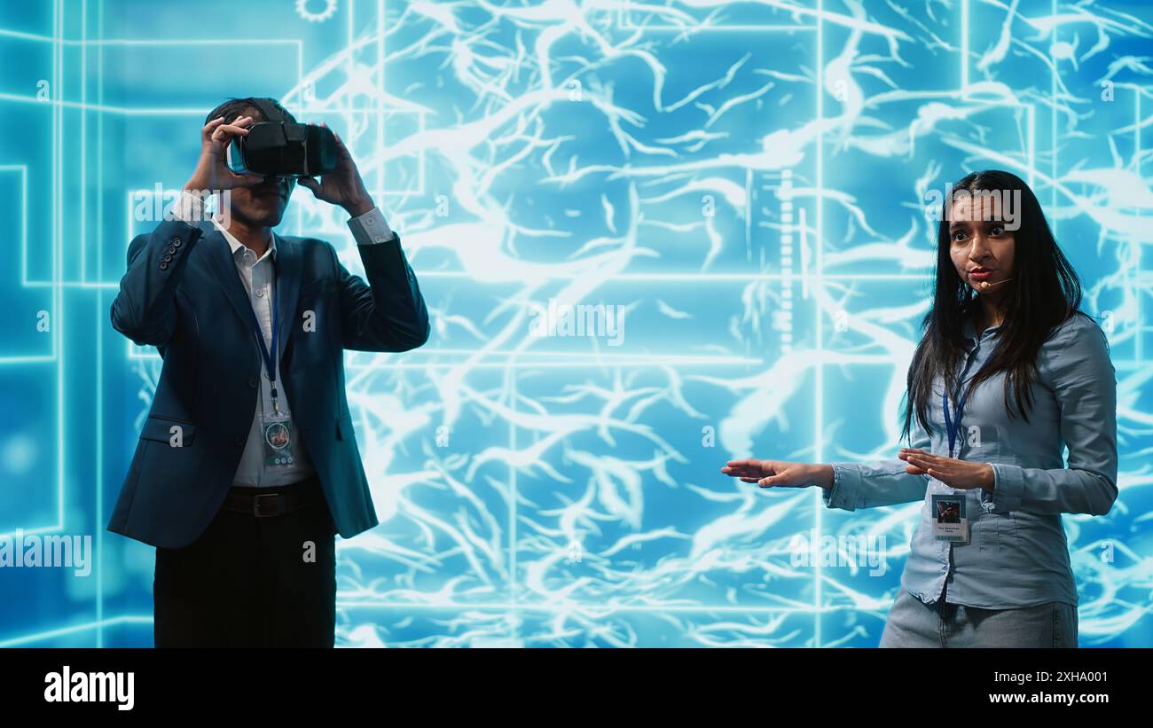 Tech experts presenting VR headset and AI tech during summit ...