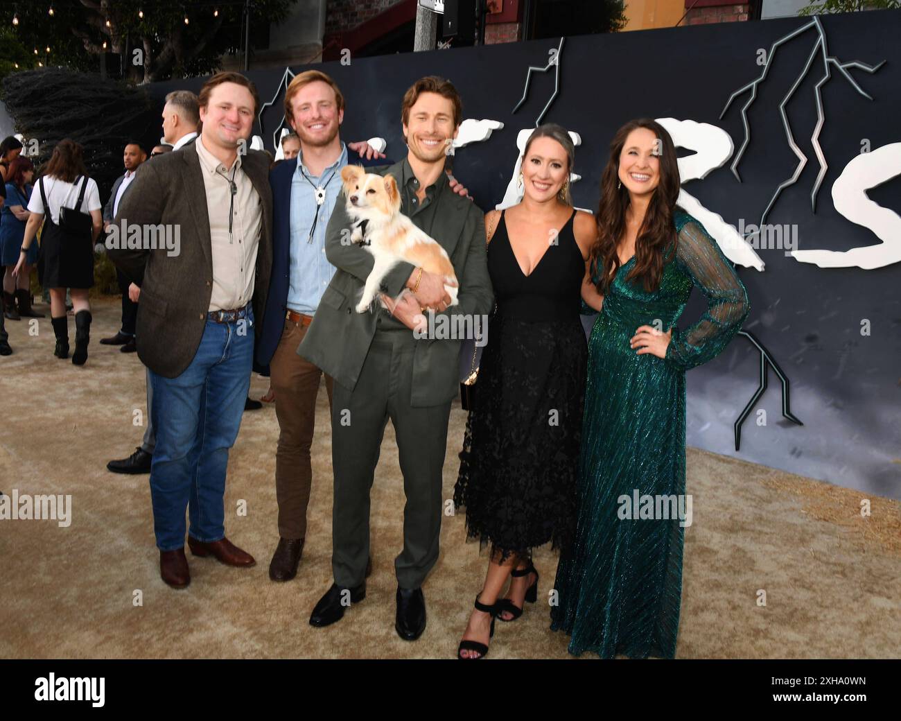 LOS ANGELES, CALIFORNIA - JULY 11: Glen Powell (C) and family attend ...