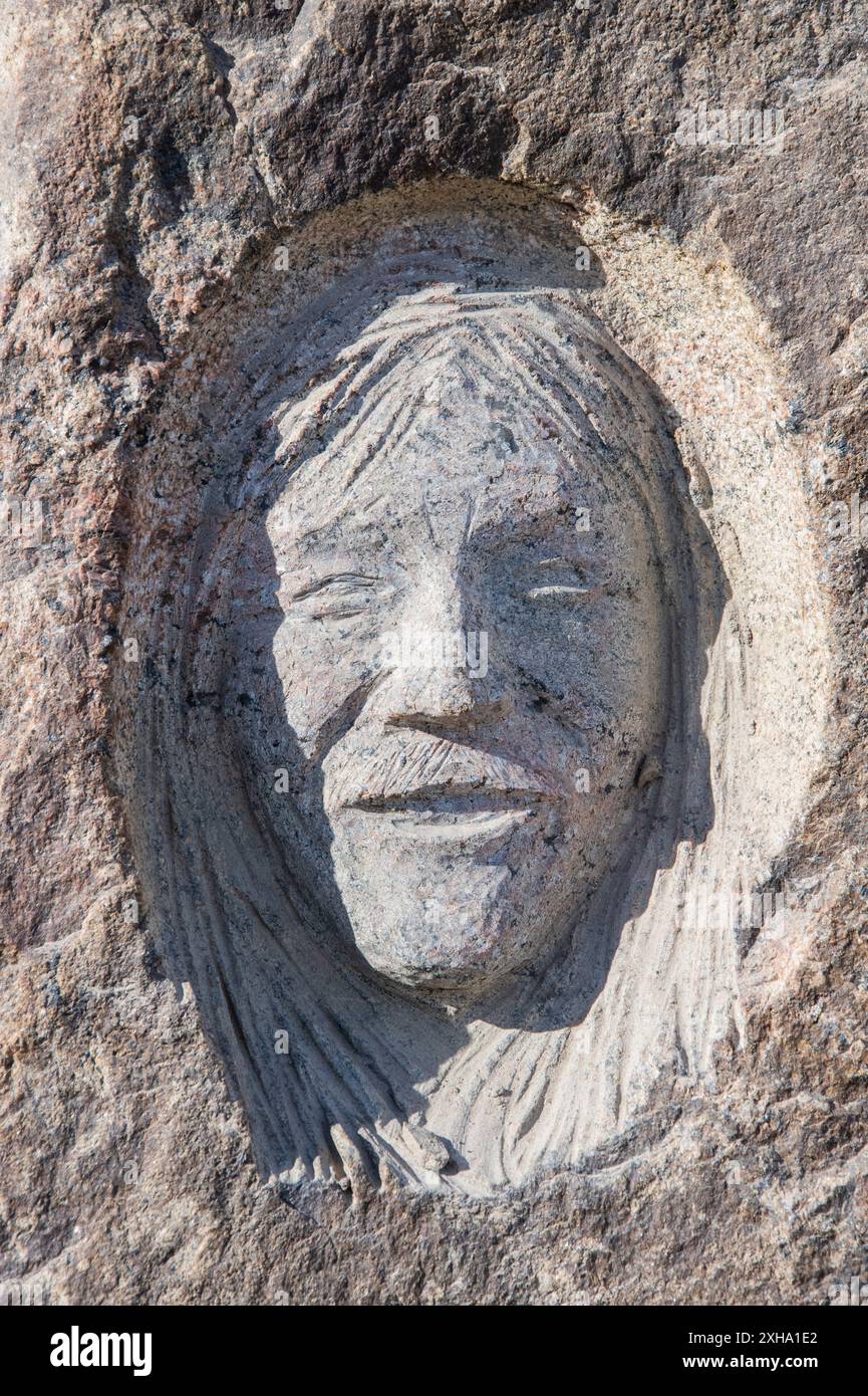 Sculpture of Inuit faces at the Legislative Assembly of Nunavut on ...
