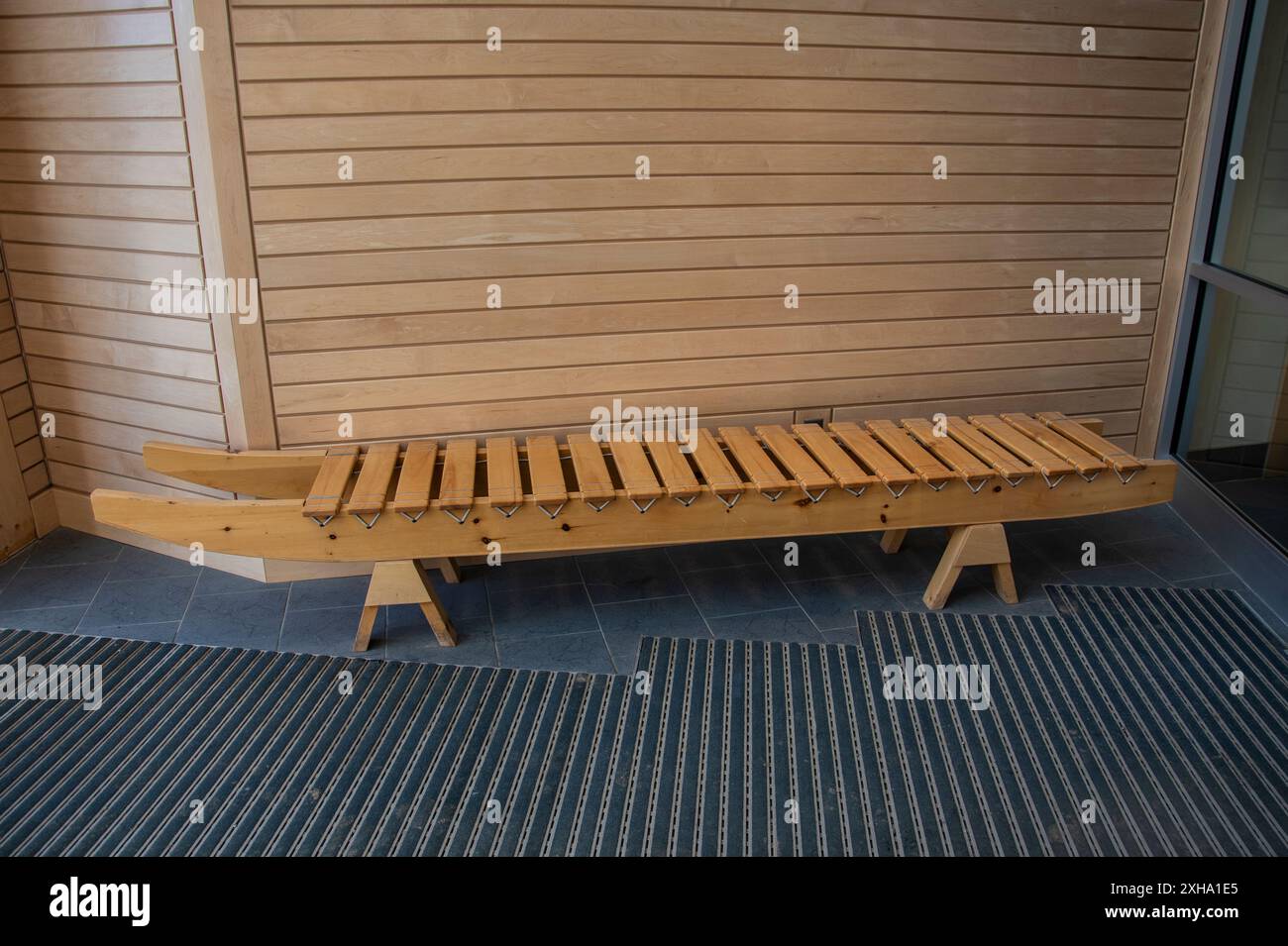 Inuit qamutiik wooden sled bench in the lobby at the Legislative ...