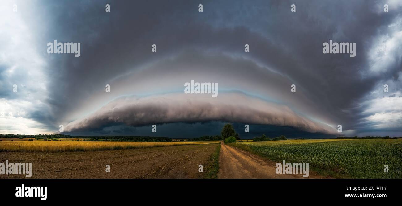Supercell storm clouds over the fields in summer Stock Photo - Alamy