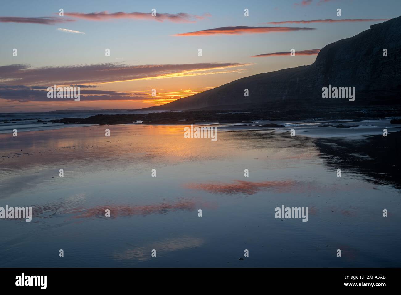 Sunset on the Cliffs at Dunraven Bay, South Wales, with Reflections and ...