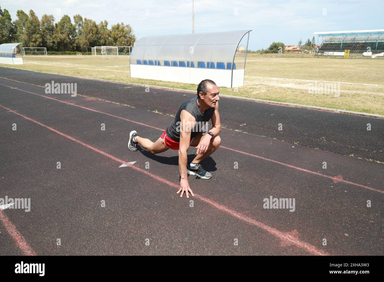 Leg Stretching After The Run Effort Stock Photo - Alamy