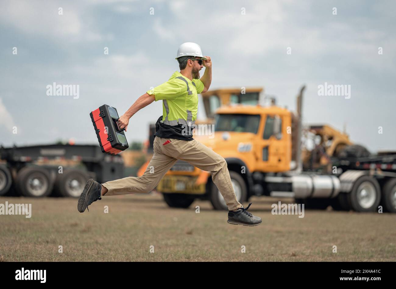 Construction builder excited jump hi-res stock photography and images ...