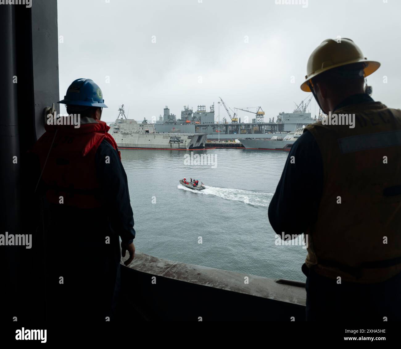 Boatswain’s Mate Seaman Alfredo Gonzalez, left, and Boatswain’s Mate ...