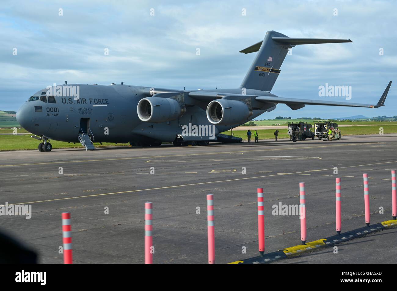 A 911th Airlift Wing C-17 Globemaster III sits on the flight line at ...