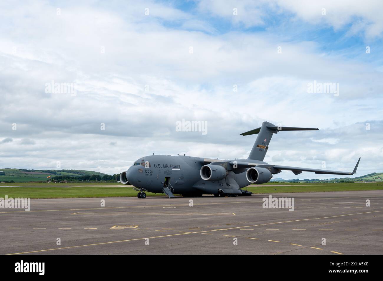 A 911th Airlift Wing C-17 Globemaster III sits on the flight line at ...