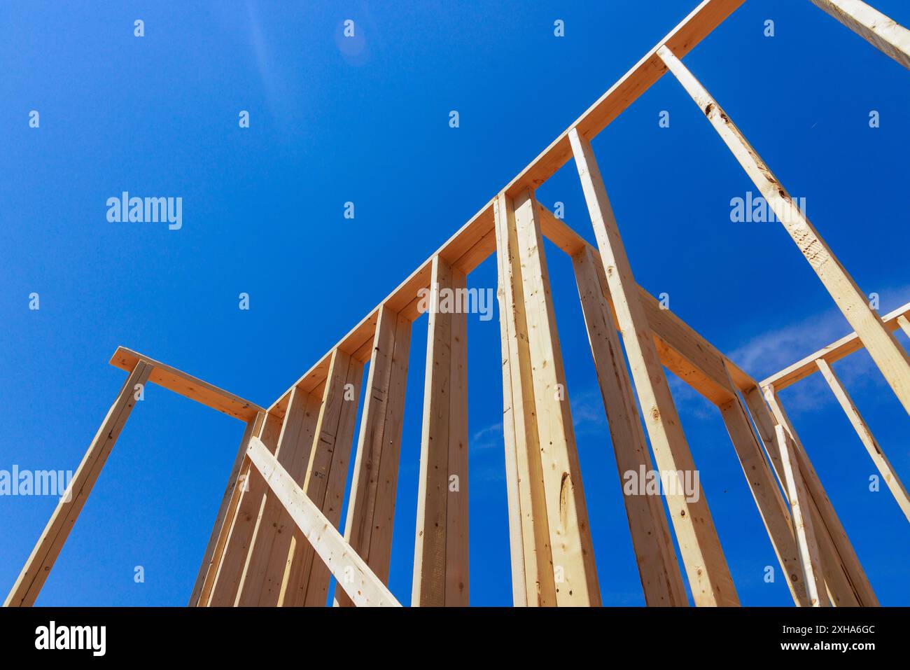 Building an interior timber support beam during construction of new ...