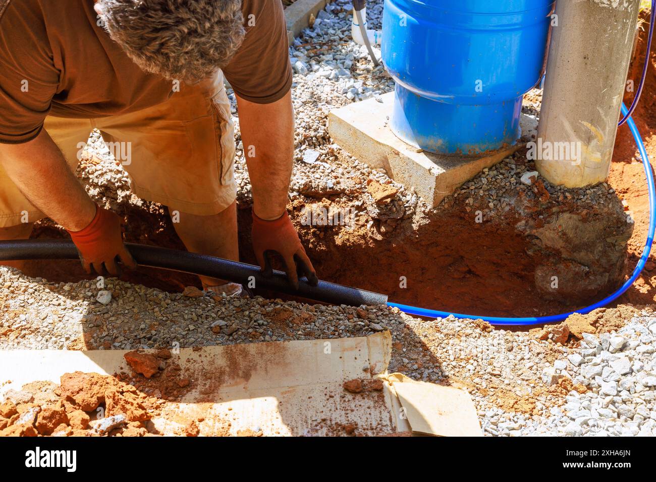 Plumbing technician applied thermal insulation isolation to water pvc ...