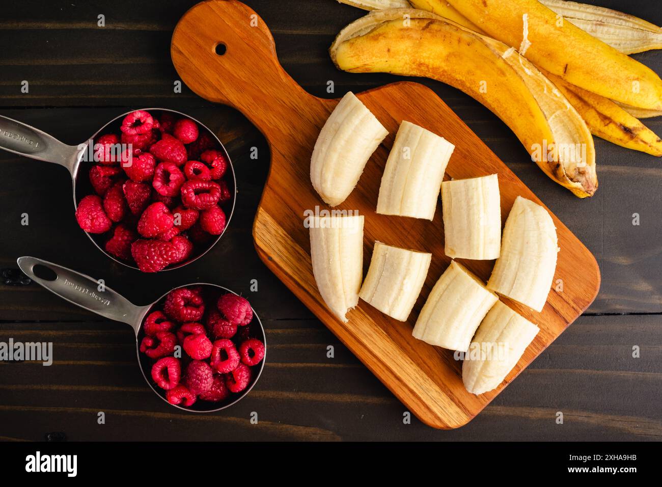 Prepping Fruit for a Banana Raspberry Smoothie: Peeled and chopped ...