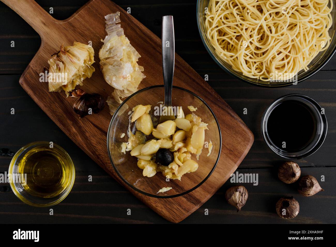 Roasted Garlic Cloves with a Black Garlic Clove: Two types of garlic ...