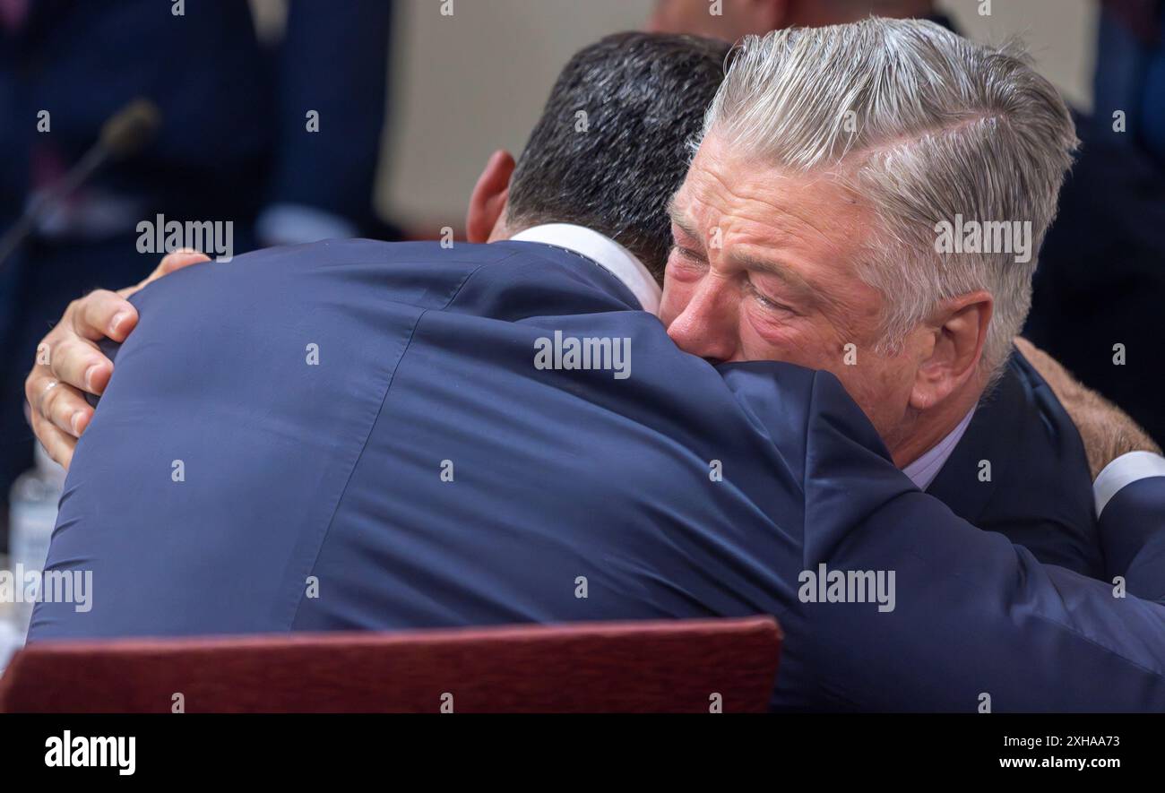Actor Alec Baldwin, right, hugs his defense attorney Alex Spiro after ...