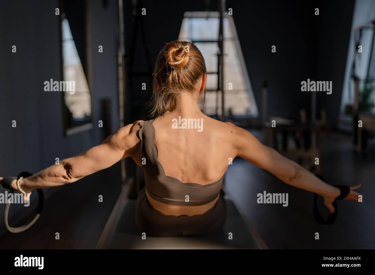 Modern Pilates studio with bright, spacious windows for exercise and ...