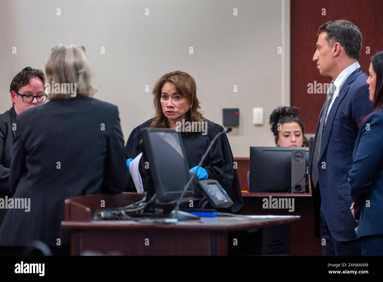Judge Mary Marlowe Sommer, center, questions special prosecutor Kari Morrissey, second from left ...